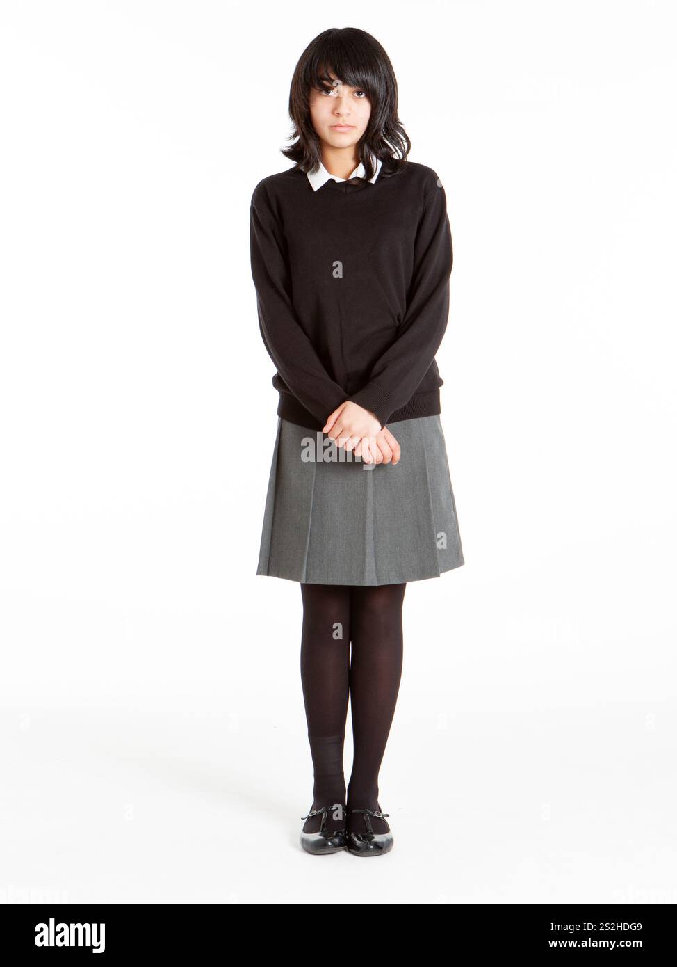 Early Teenage Students: Nervous Girl. A nervous looking early teenage ...