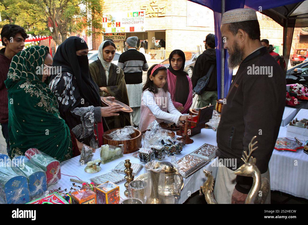 Visitors take keen interest at stall during Punjab Sufi Festival ...