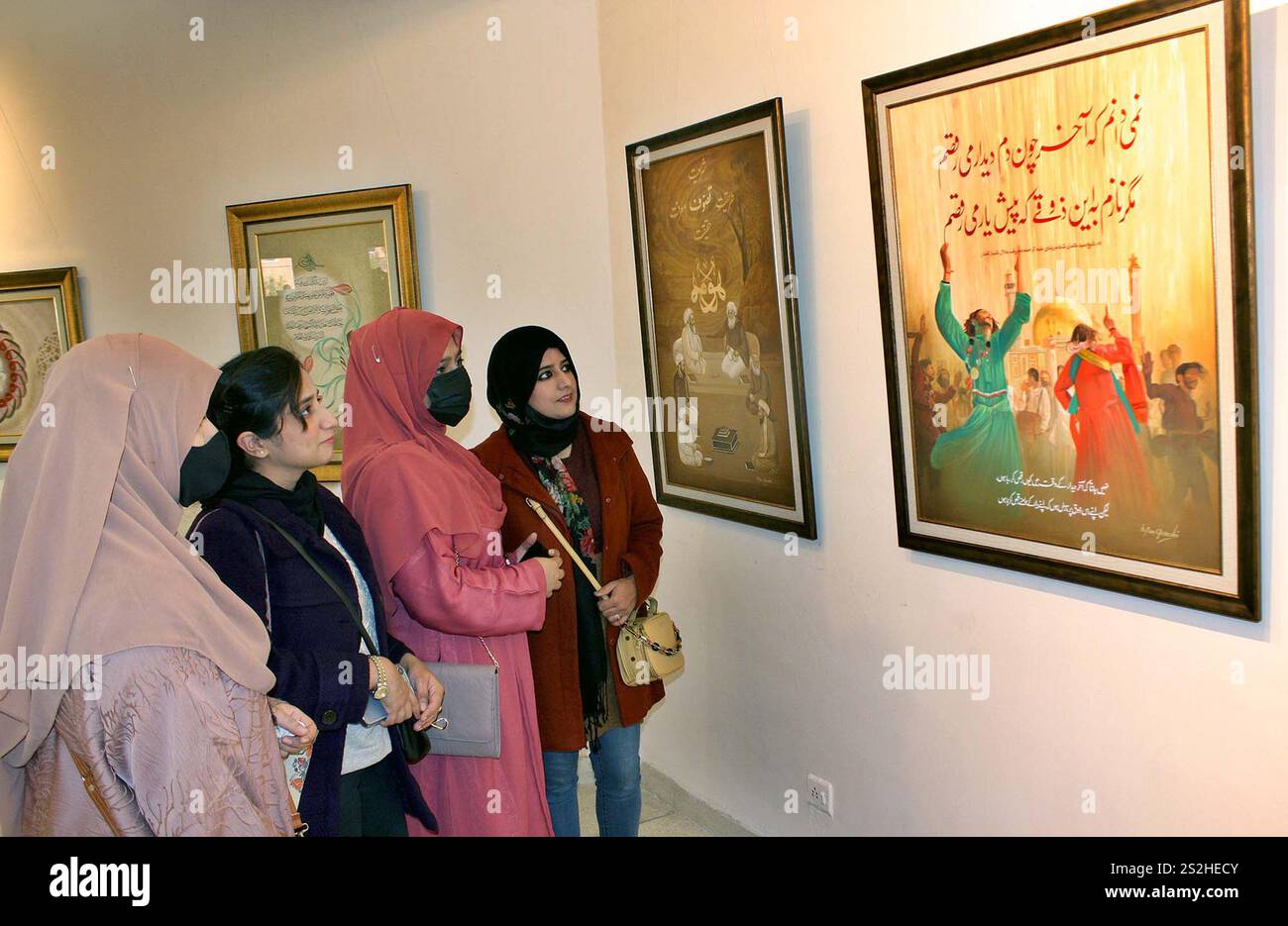 Visitors take keen interest in painting during Punjab Sufi Festival ...