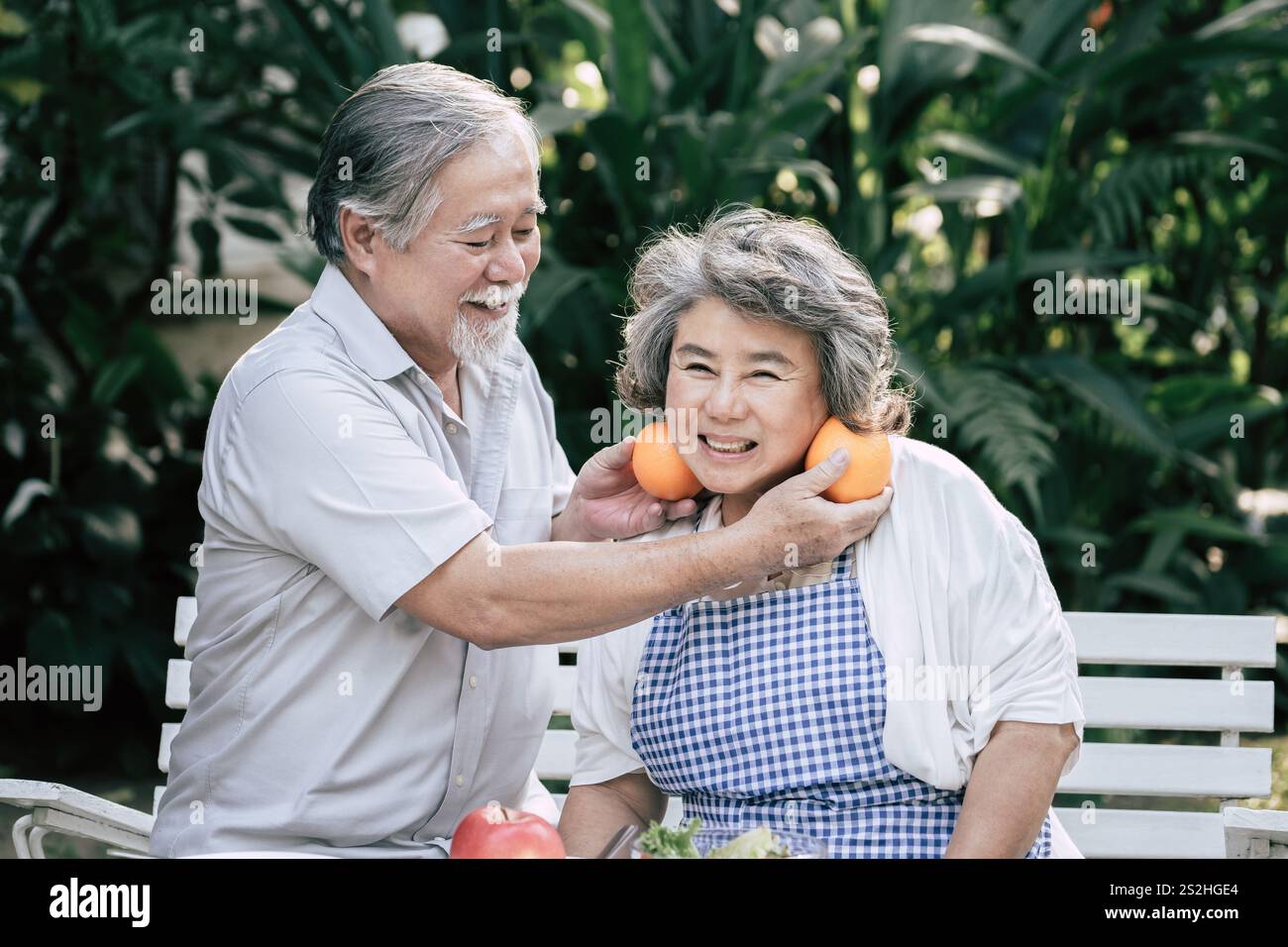 Elderly couples Cooking Healthy food together Stock Photo - Alamy