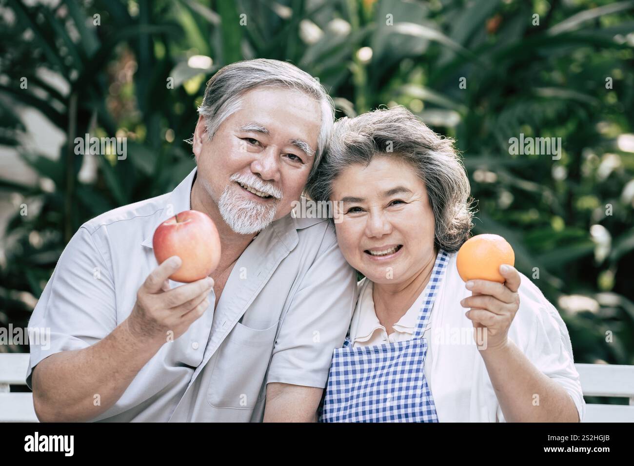 Elderly couples Cooking Healthy food together Stock Photo - Alamy