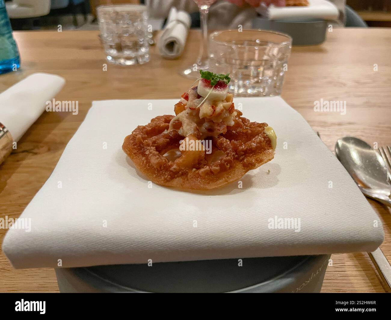 Exquisite gourmet dishes elegantly presented in a fine dining ...