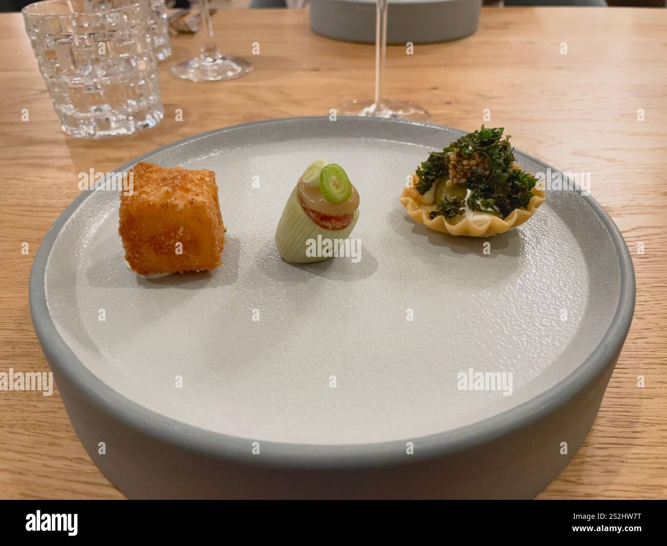 Exquisite gourmet dishes elegantly presented in a fine dining ...