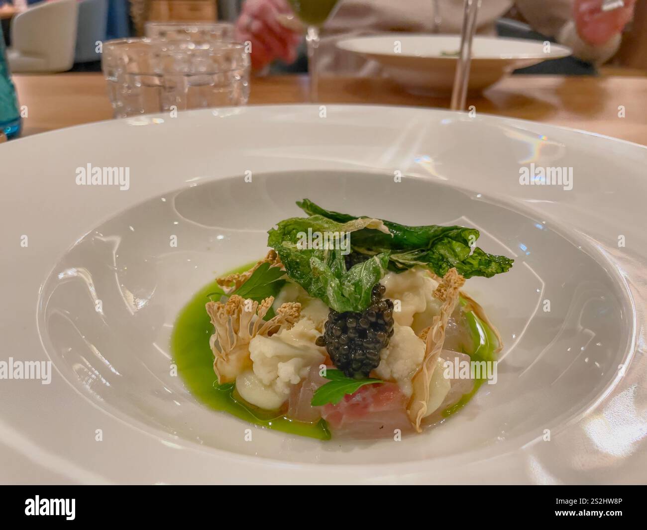 Exquisite gourmet dishes elegantly presented in a fine dining ...