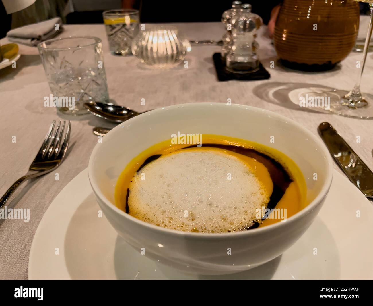 Exquisite gourmet dishes elegantly presented in a fine dining ...