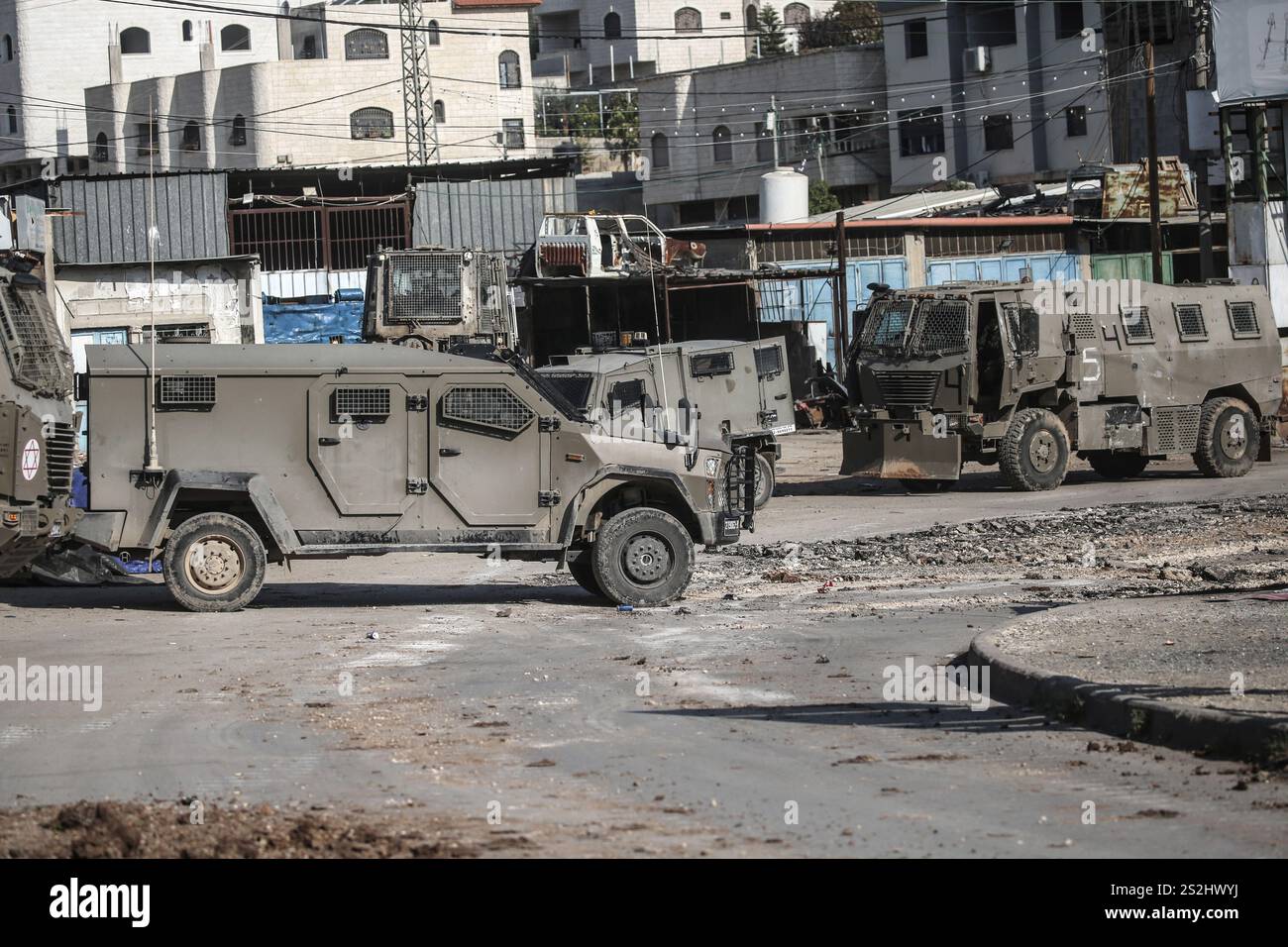 Jenin, Palestine. 07th Jan, 2025. An Israeli military vehicles surround ...