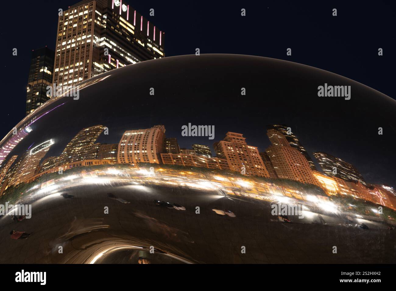 Chicago Millennium city park. Cityscape reflection at night. Cloud Gate. Millennium Park with ...
