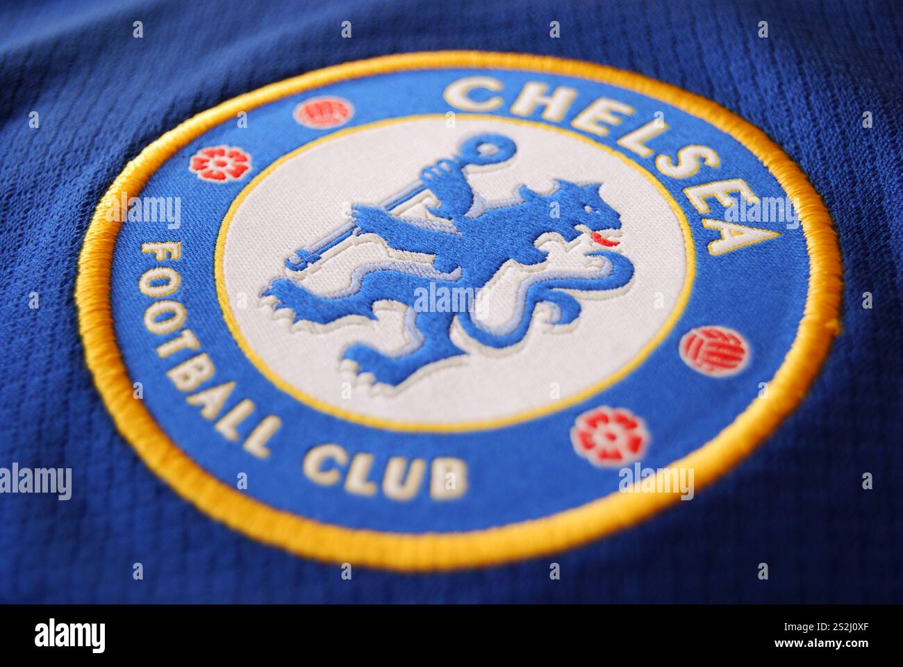Angled close up photo of Chelsea FC club badge on the shirt with depth ...
