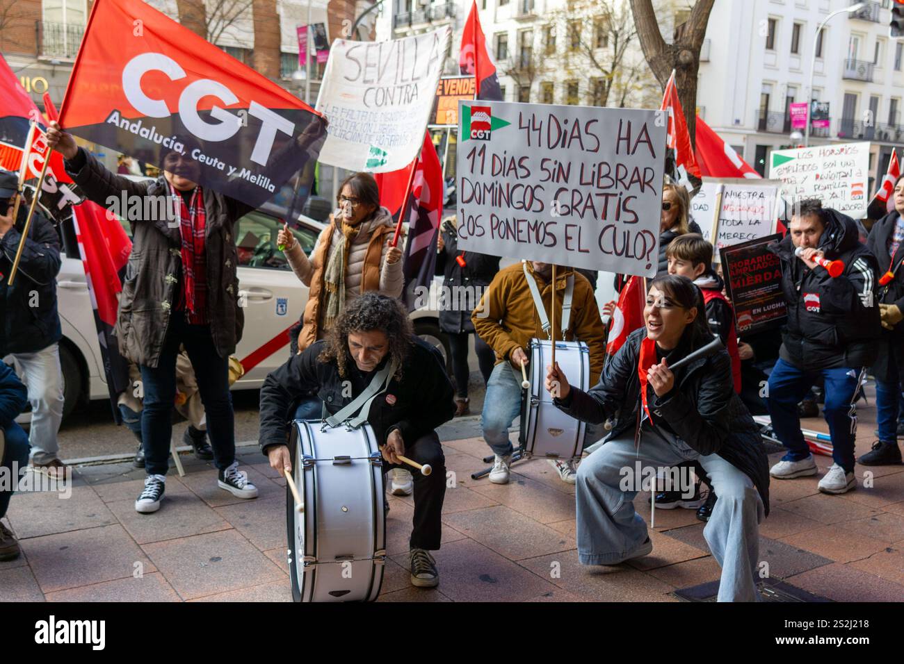 Madrid, Spain. 07th Jan, 2025. Protesters hold flags, placards and play ...