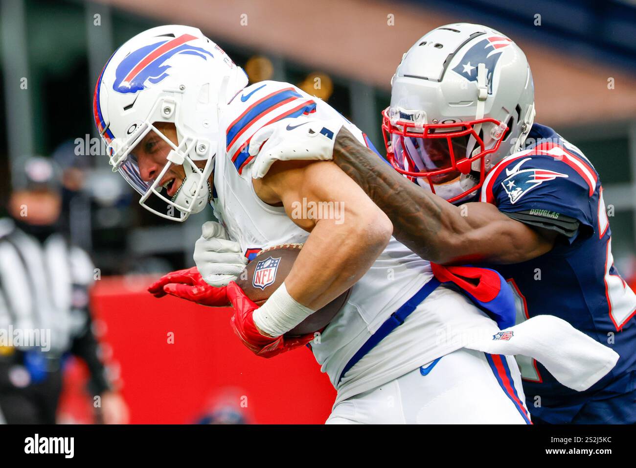 Buffalo Bills wide receiver Mack Hollins (13) is tackled by New England ...
