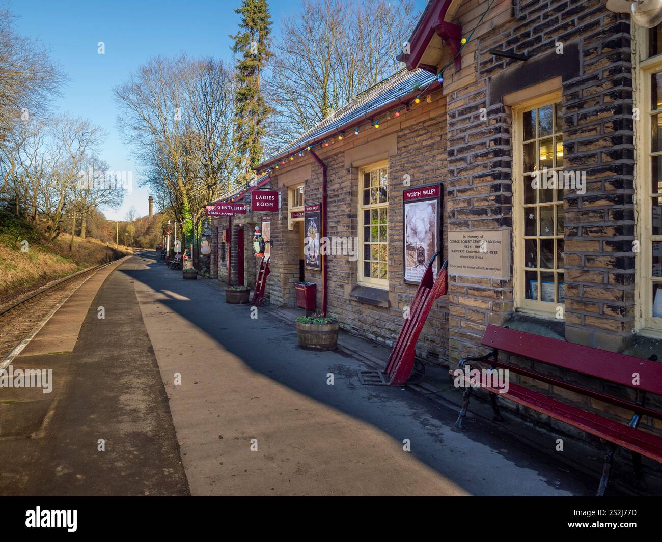 Haworth Station platform seen against a blue sky on a sunny winter day ...
