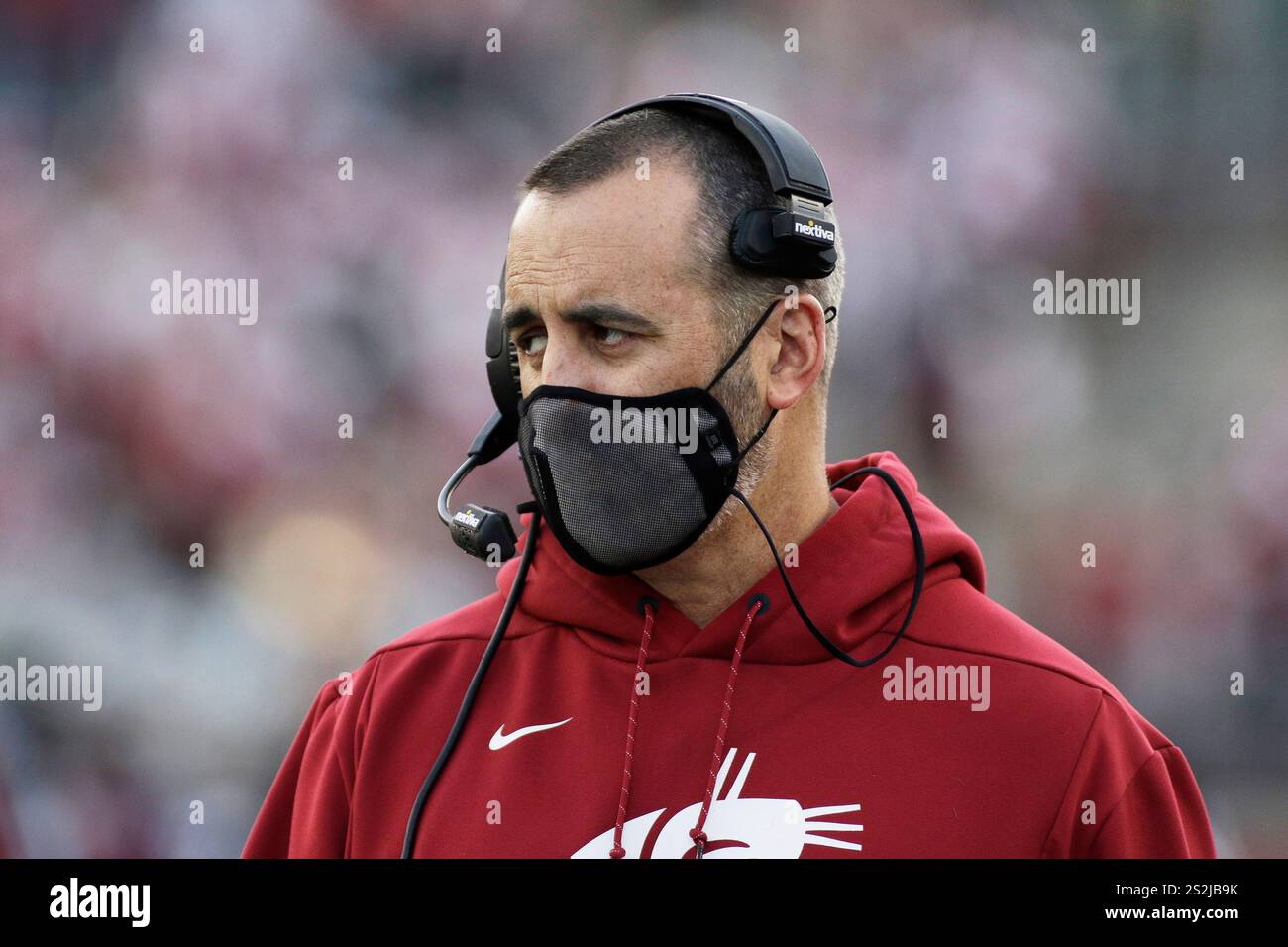 FILE - Then Washington State coach Nick Rolovich watches during the ...