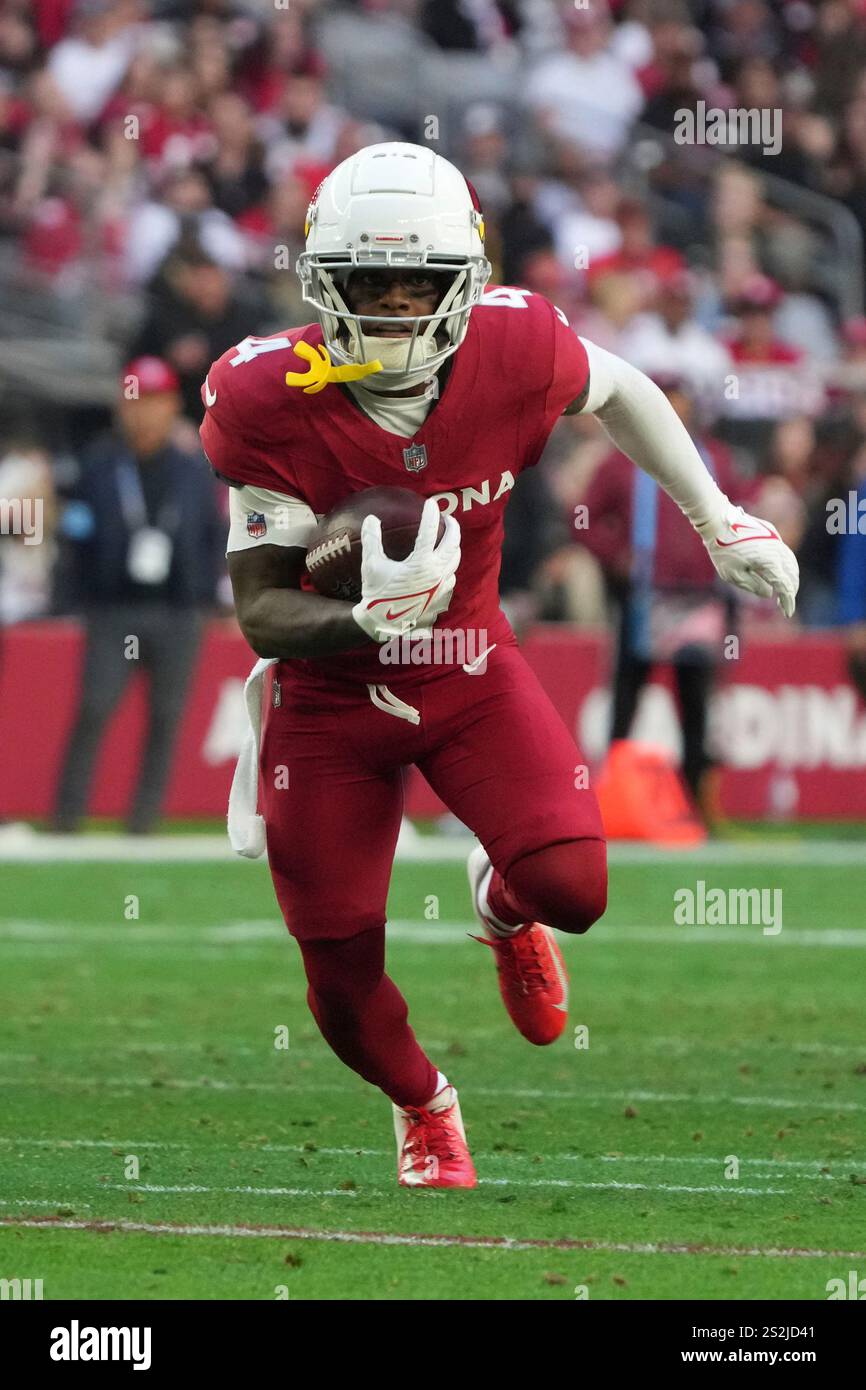 Arizona Cardinals wide receiver Greg Dortch (4) runs the ball against ...