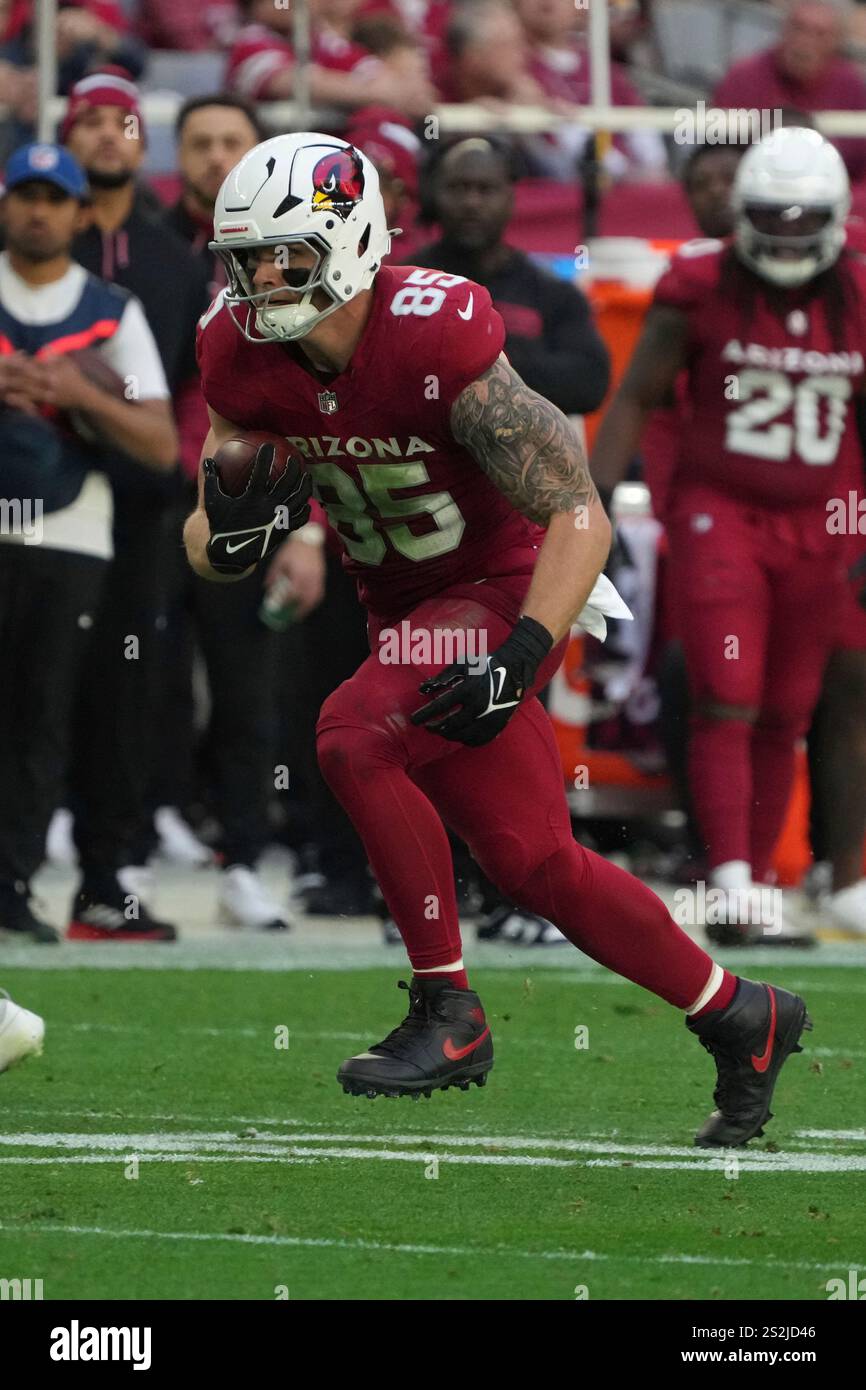 Arizona Cardinals tight end Trey McBride (85) runs the ball against the ...