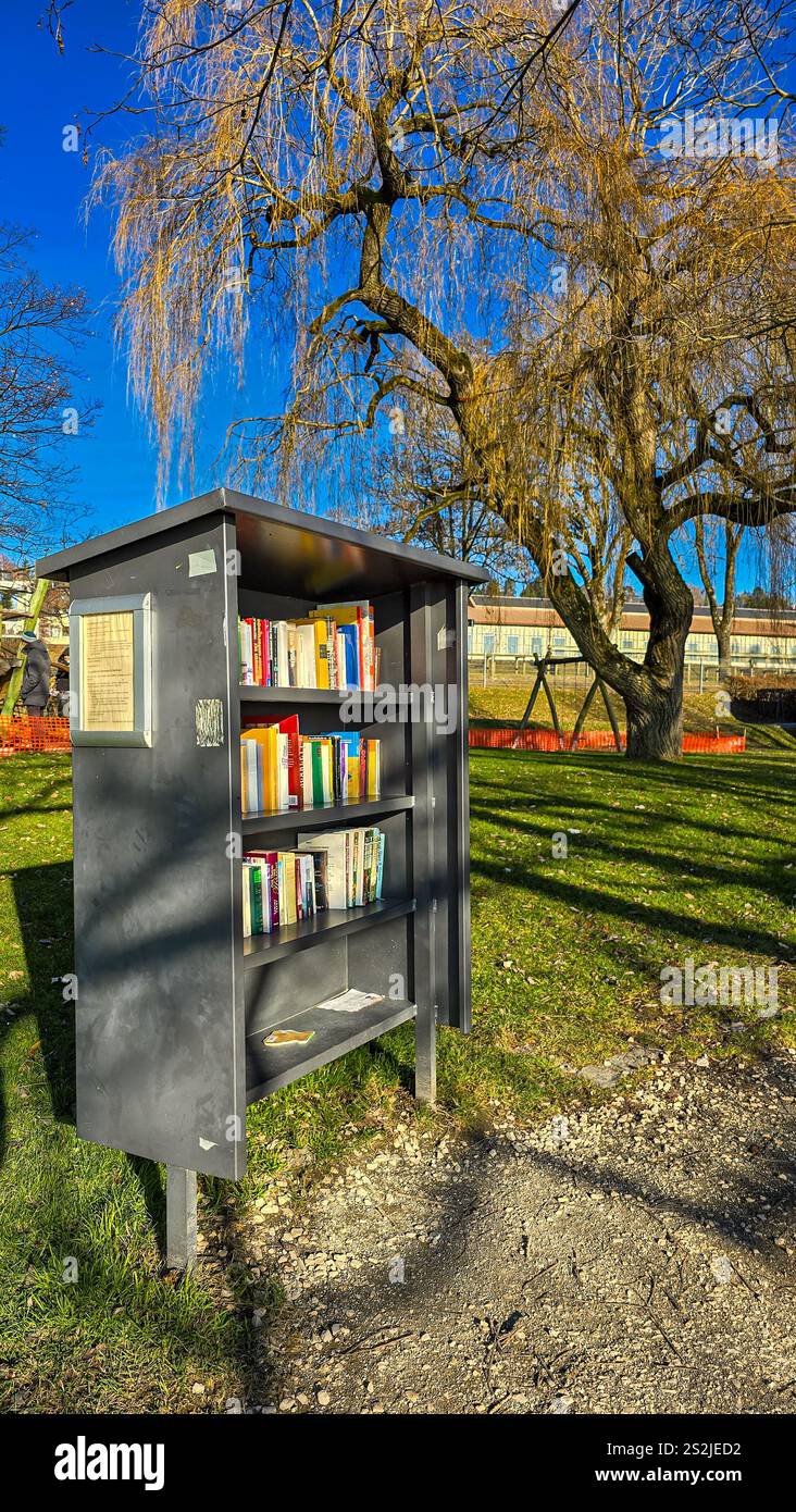 Little free library with kids hi-res stock photography and images - Alamy