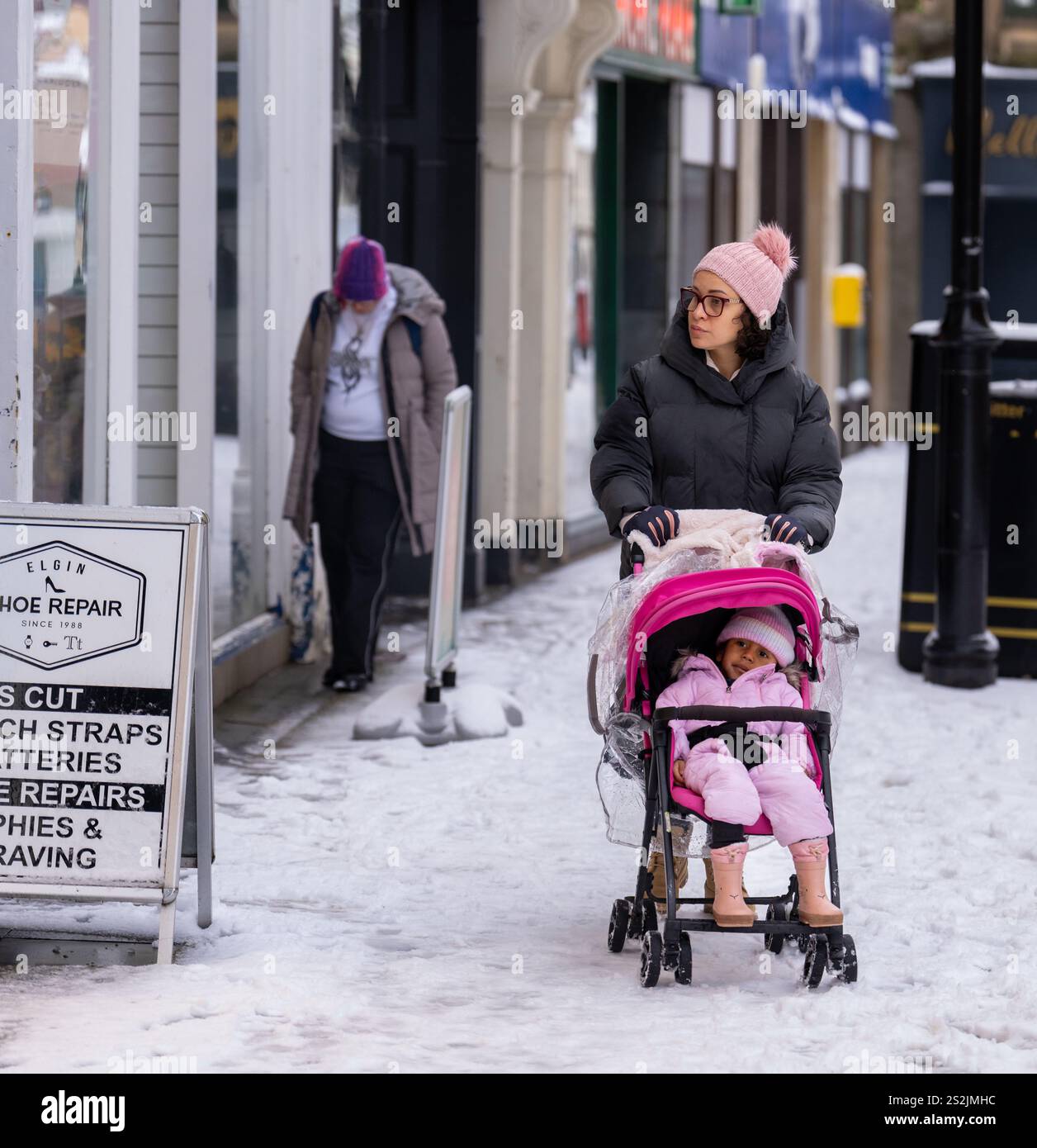 High Street, Elgin, Moray, UK. 7th Jan, 2025. This is an Asain woman ...