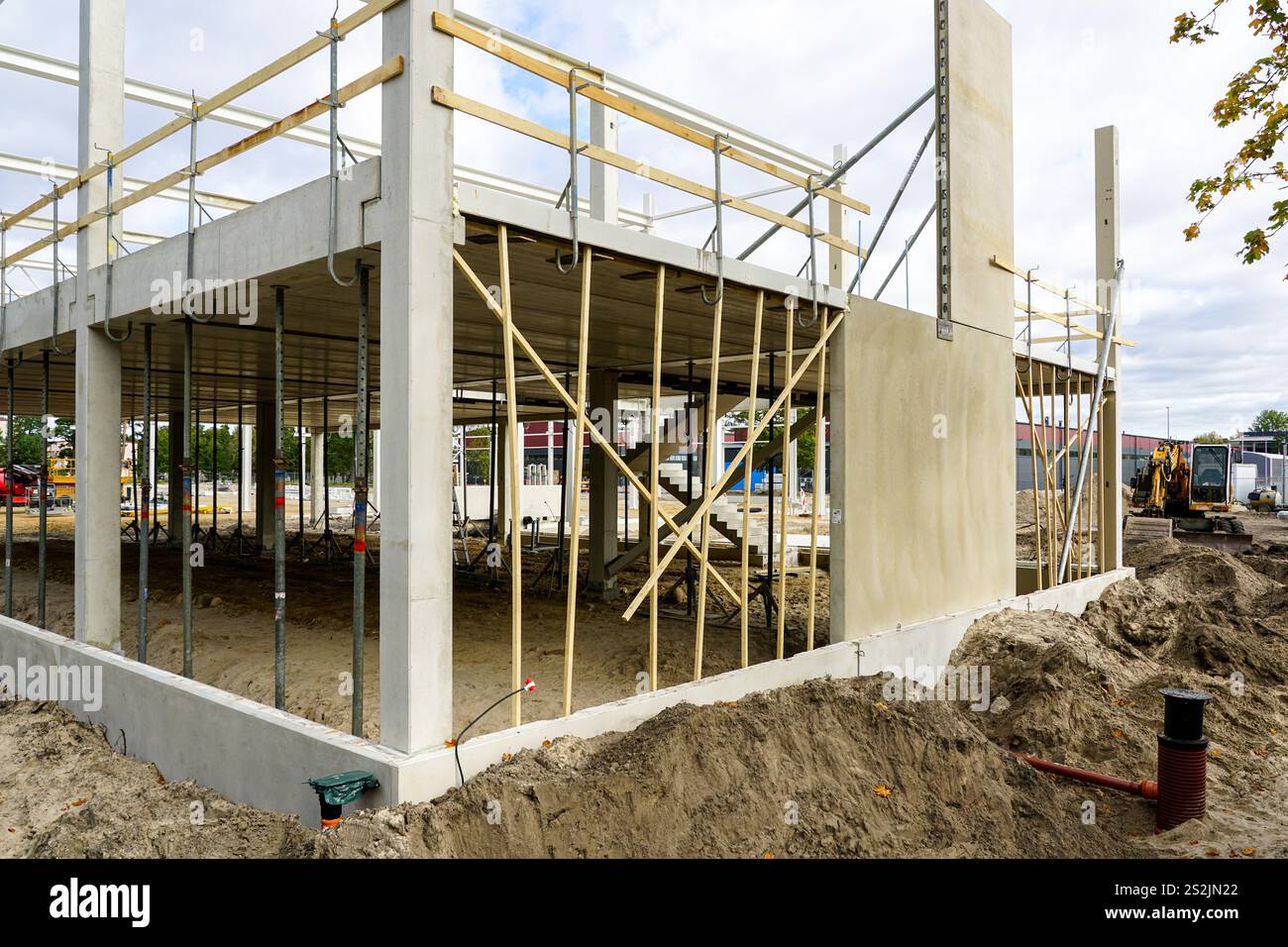 Unfinished new modern reinforced concrete and metal structure building ...