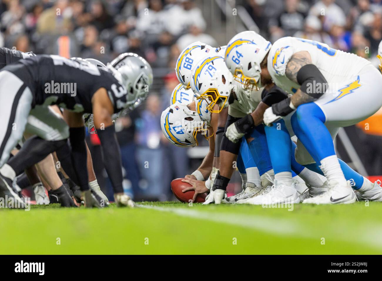 The Los Angeles Chargers line up against the Las Vegas Raiders in an ...