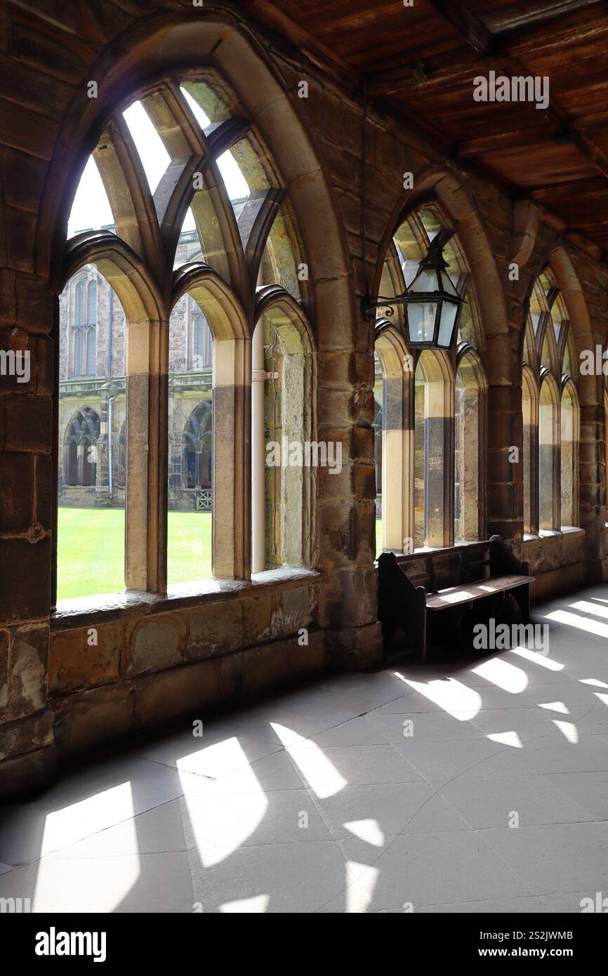 The play of light and shadows cast by arched windows in the inner ...
