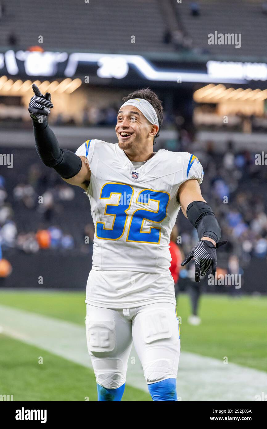Los Angeles Chargers safety Alohi Gilman (32) celebrates while walking ...