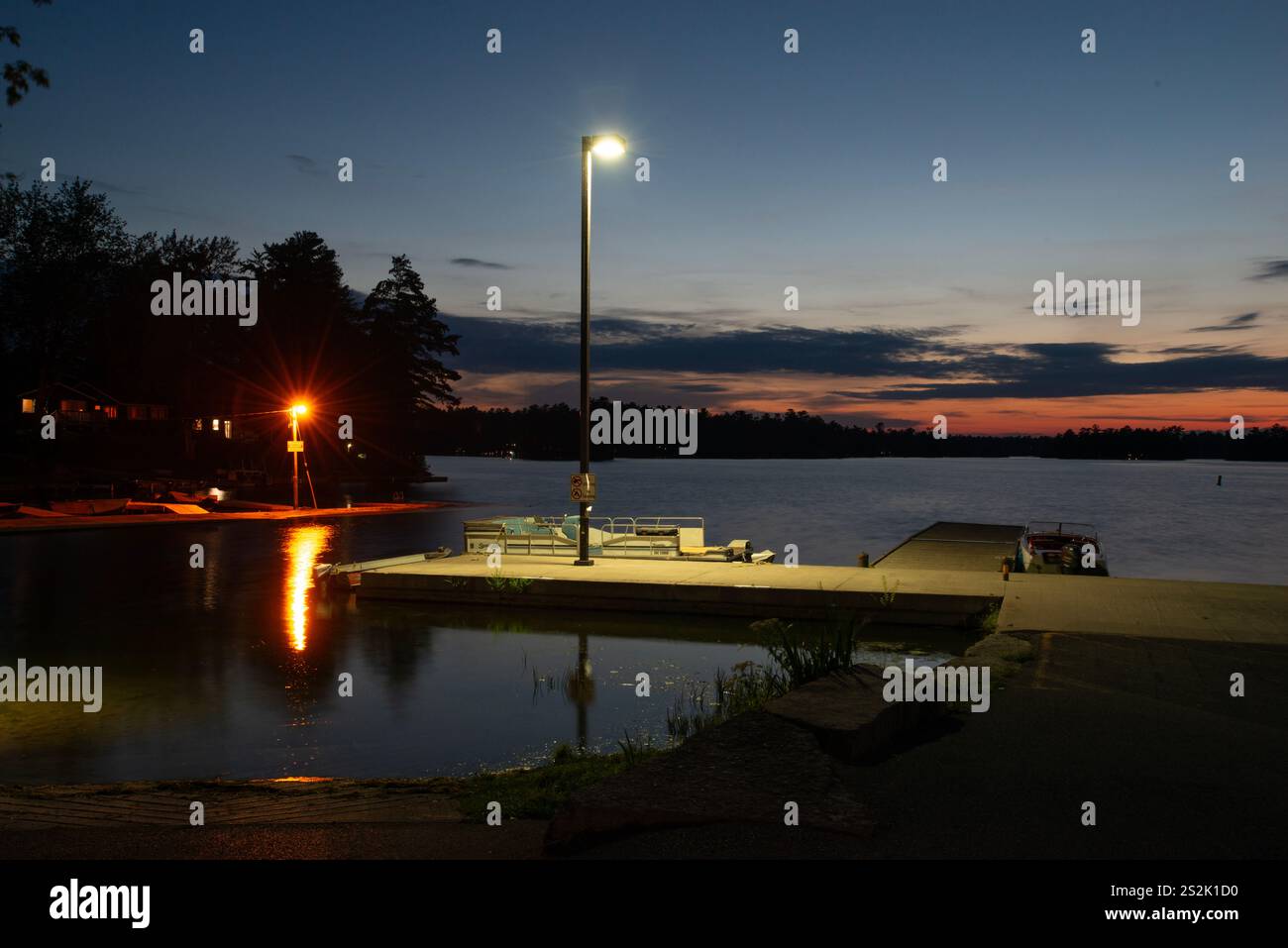 An evening lakefront view of Stoney Lake in the Kawartha Lakes region ...