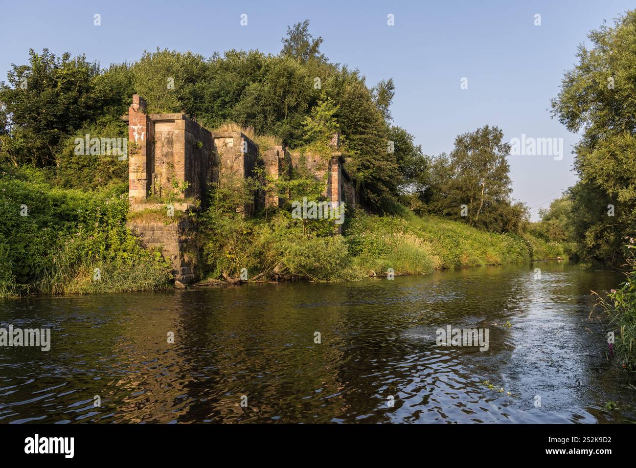 Remains of a railway bridge next to the River Mersey, Heaton Mersey ...