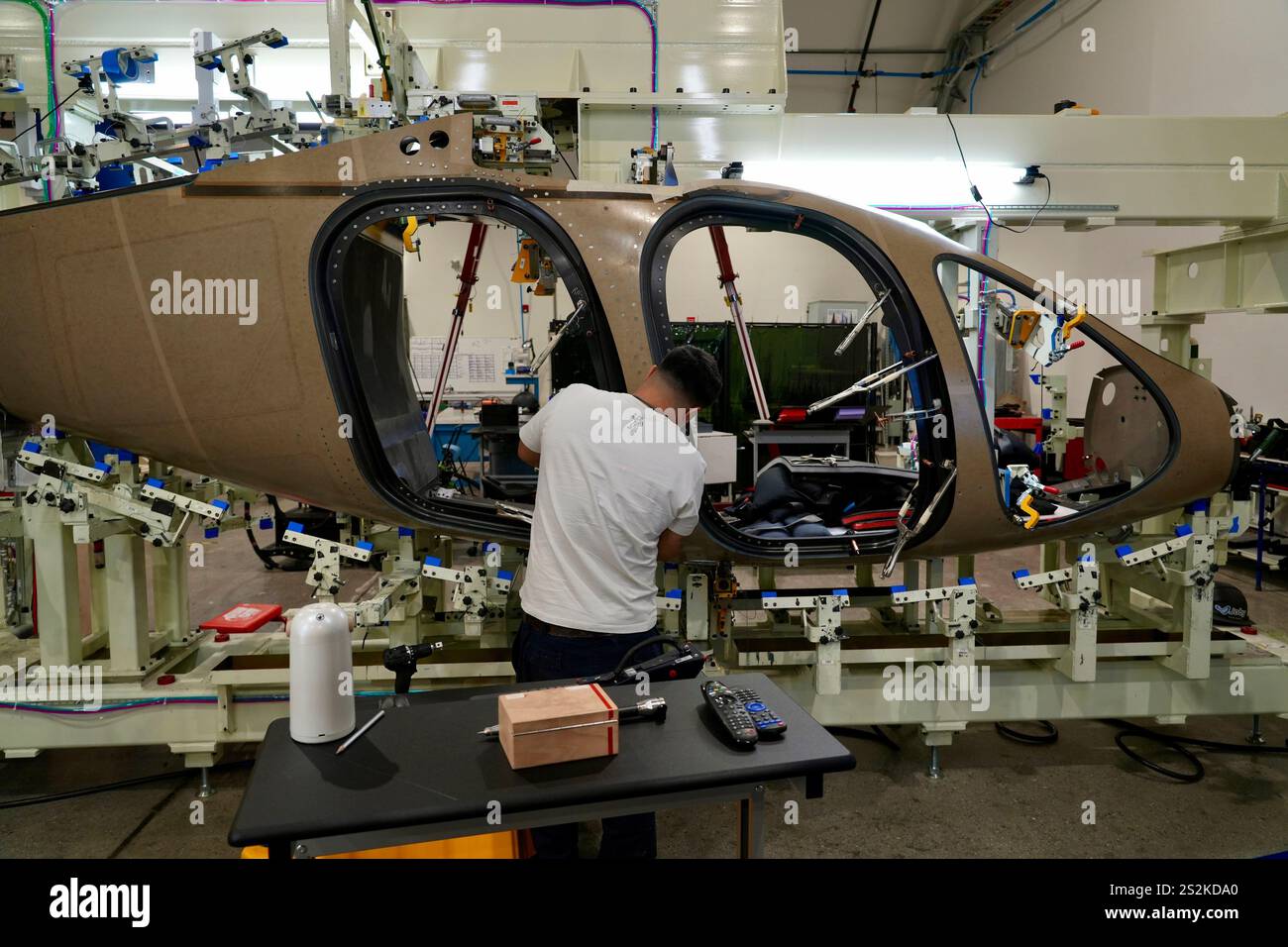 A Joby Aviation employees works on the assembly of an "electric ...