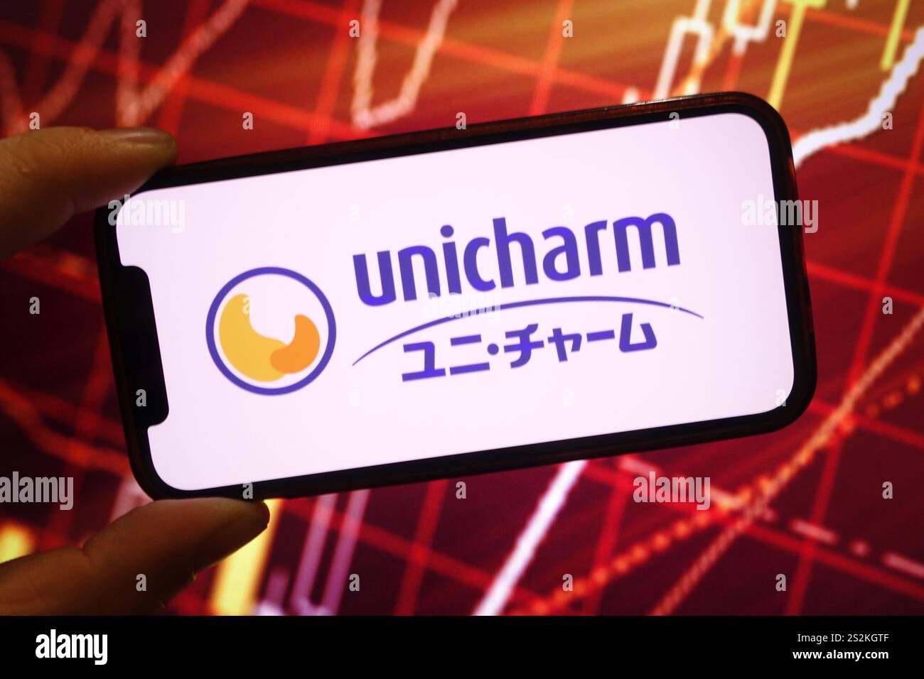 In this photo illustration, the Unicharm company logo is seen displayed ...