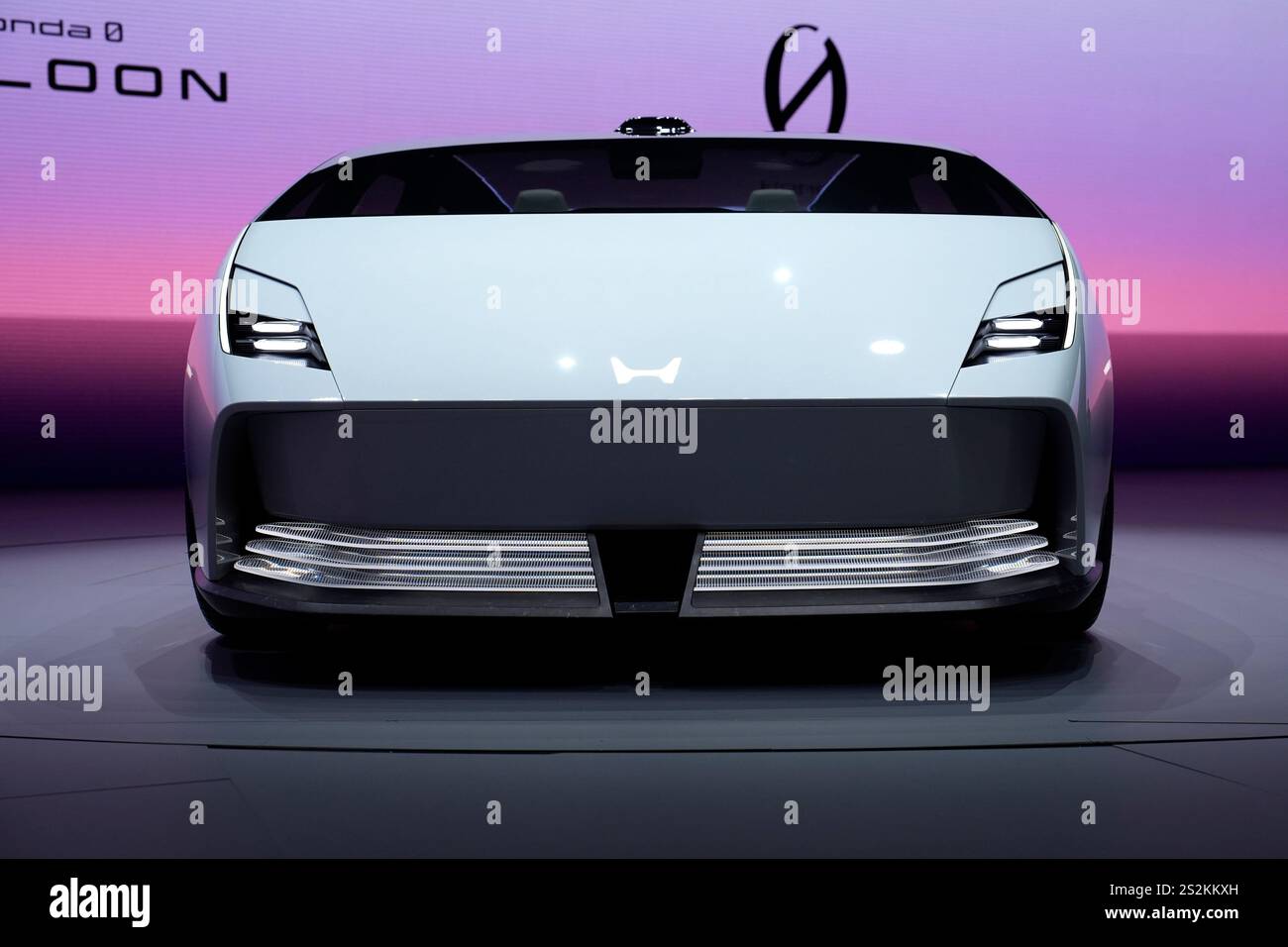 The Honda 0 Saloon EV prototype is on display at the Honda booth during ...