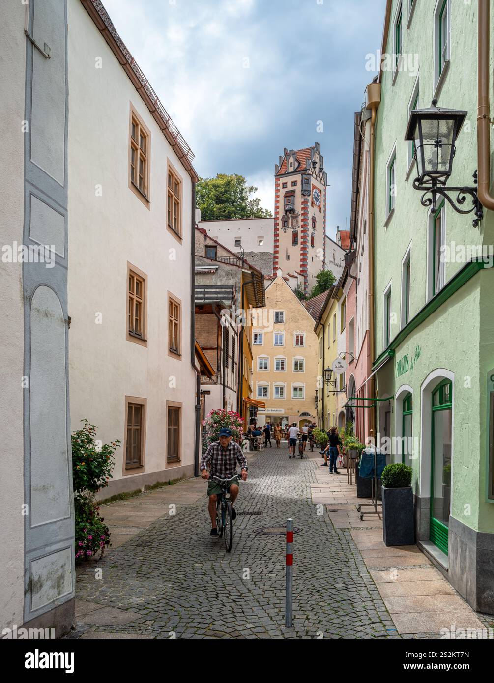 Fussen, Germany - August 5, 2024: A lively german town street in Fussen ...