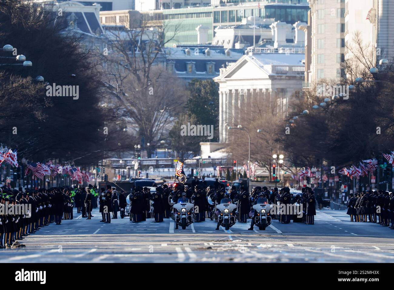 The motorcade carrying the casket of former President Jimmy Carter ...