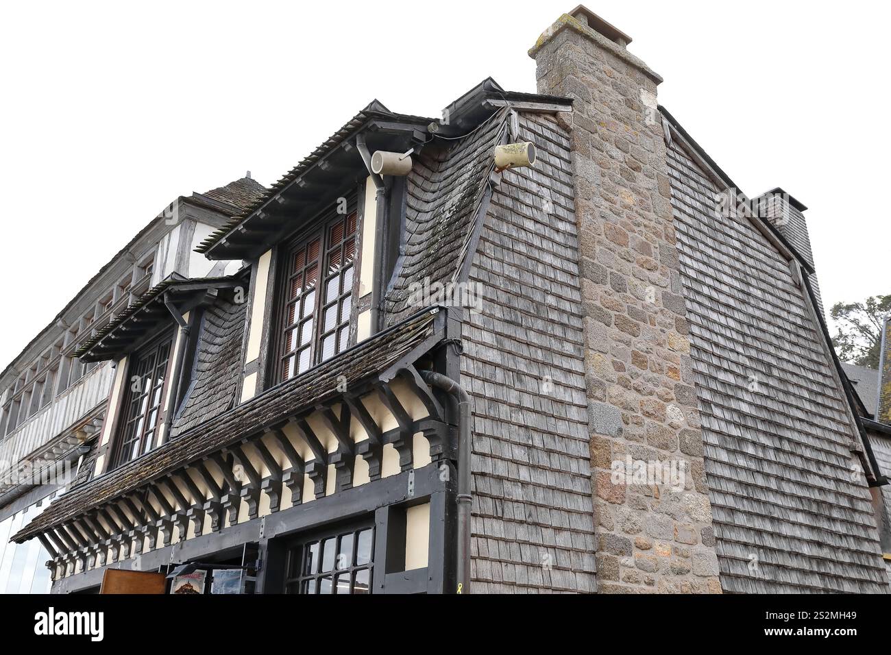 171 Mont-Saint-Michel: Wood-shingle clad mansard roof and wall, built ...