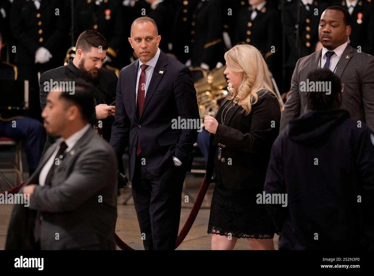 House Minority Leader Hakeem Jeffries, D-N.Y., left, arrives before the ...