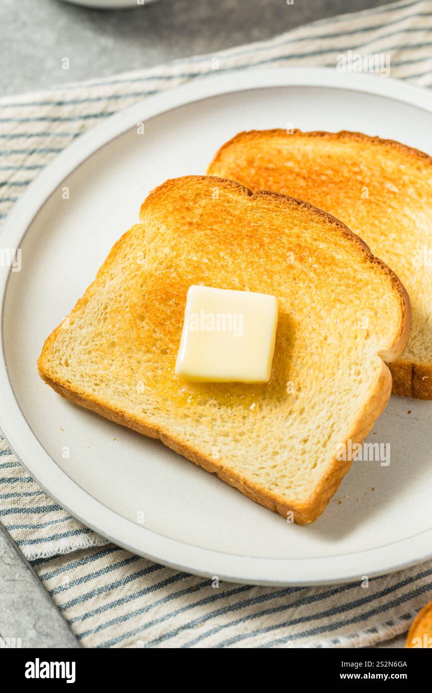 Homemade Toasted Bread Slice with Butter Ready for Breakfast Stock ...