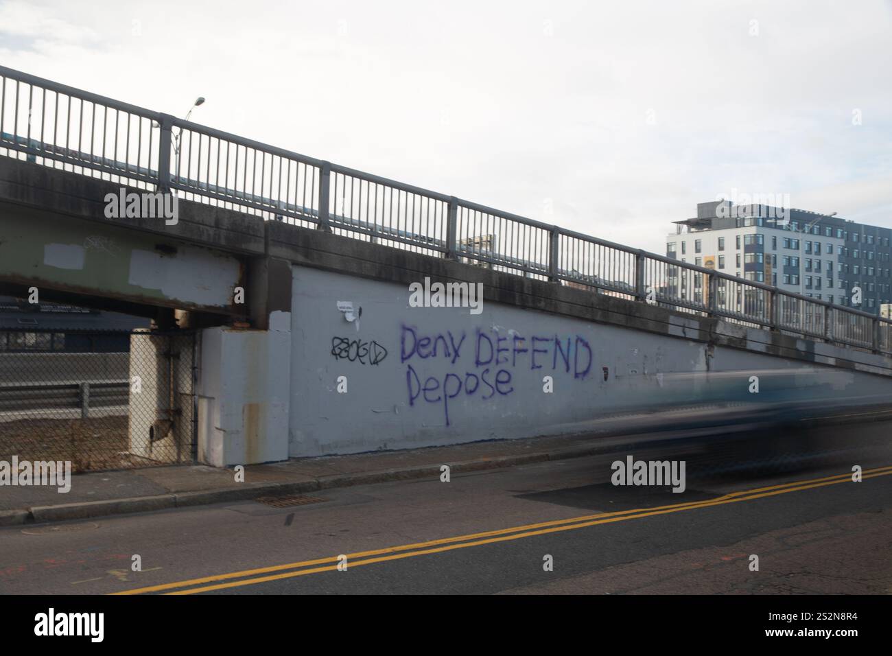 Boston, USA. 07th Jan, 2025. “Deny, Defend, Depose” graffiti on a wall ...
