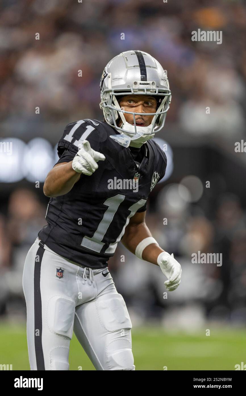 Las Vegas Raiders wide receiver Tre Tucker (11) lines up against the ...