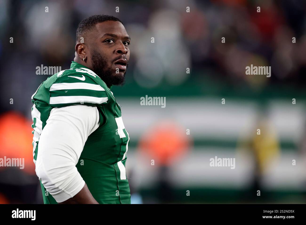 New York Jets defensive end Micheal Clemons (72) reacts after an NFL ...