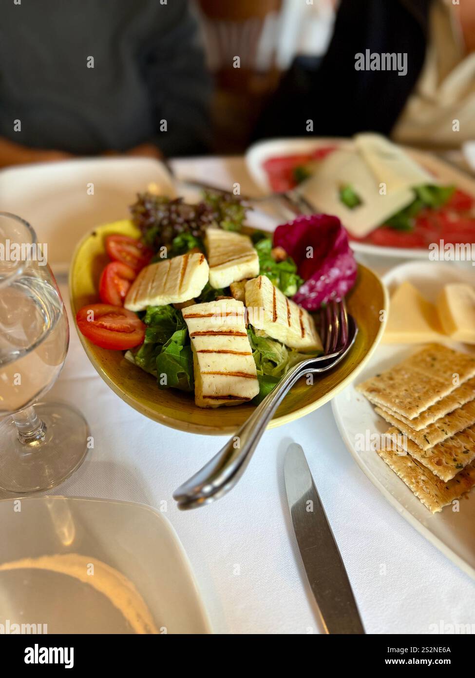 Grilled Halloumi cheese salad served at restaurant. Ready to eat Stock ...