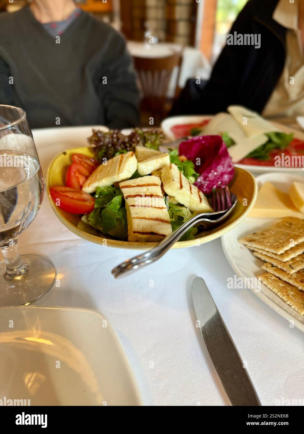 Grilled Halloumi cheese salad served at restaurant. Ready to eat Stock ...