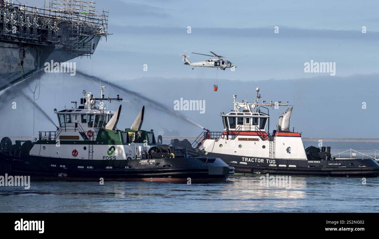 Firefighters combat blaze aboard USS Bonhomme Richard LHD-6 Stock Photo ...