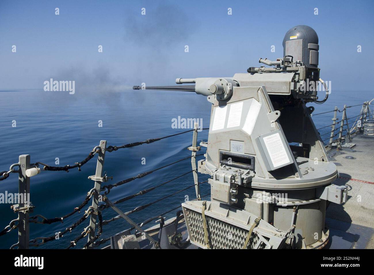 Firing a Mk 38 25mm autocannon by remote control Stock Photo - Alamy