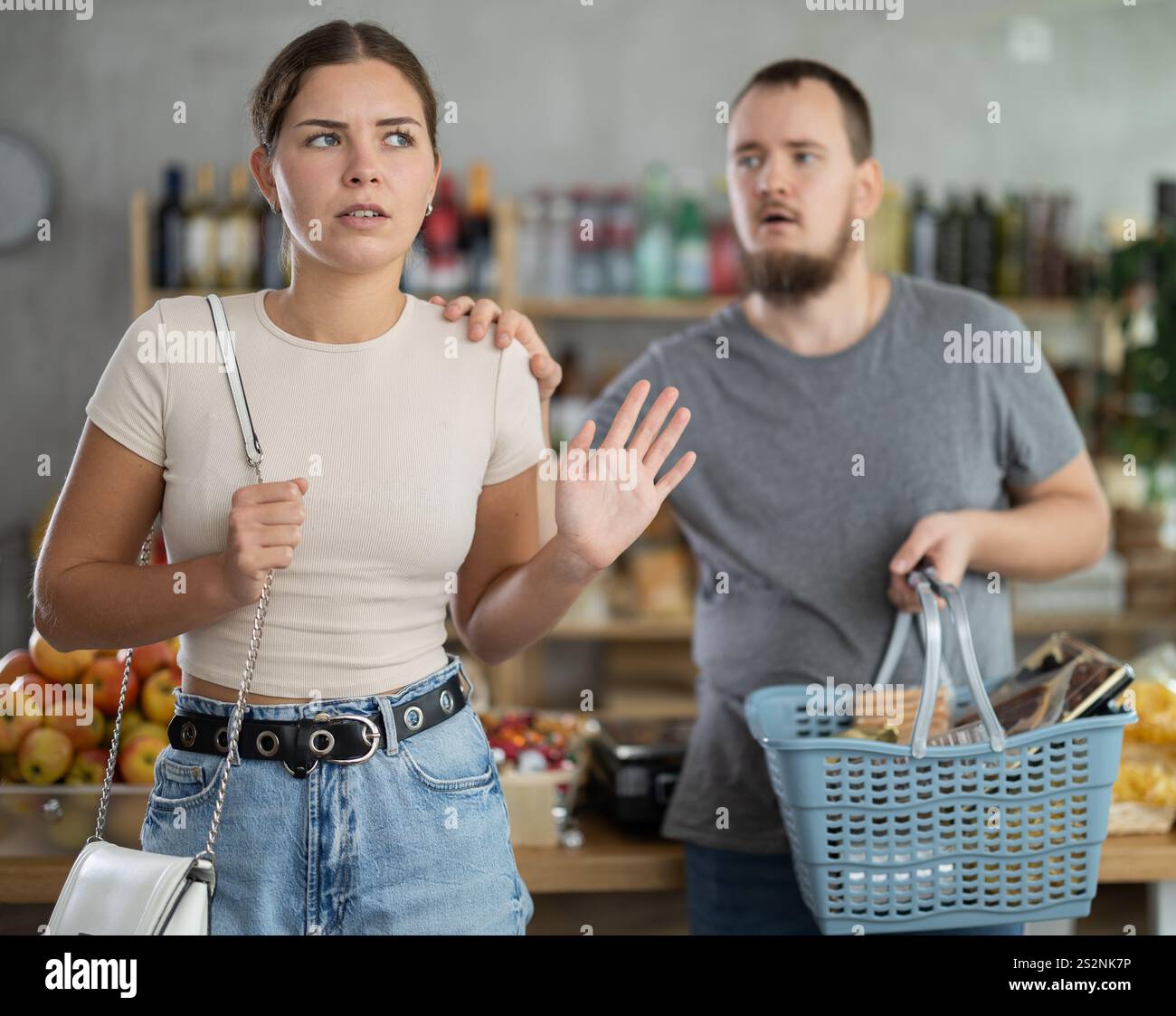 Angry girl turned away from husband during quarrel, he want to make ...