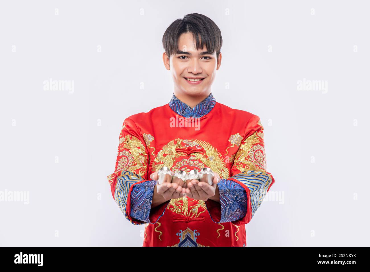 Man wear Cheongsam suit smile and standing to give the gift money to ...