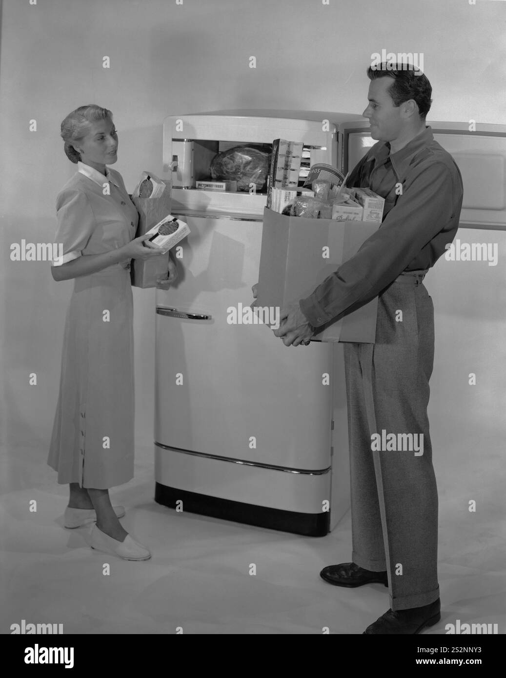 Man holds box in Black and White Stock Photos & Images - Alamy