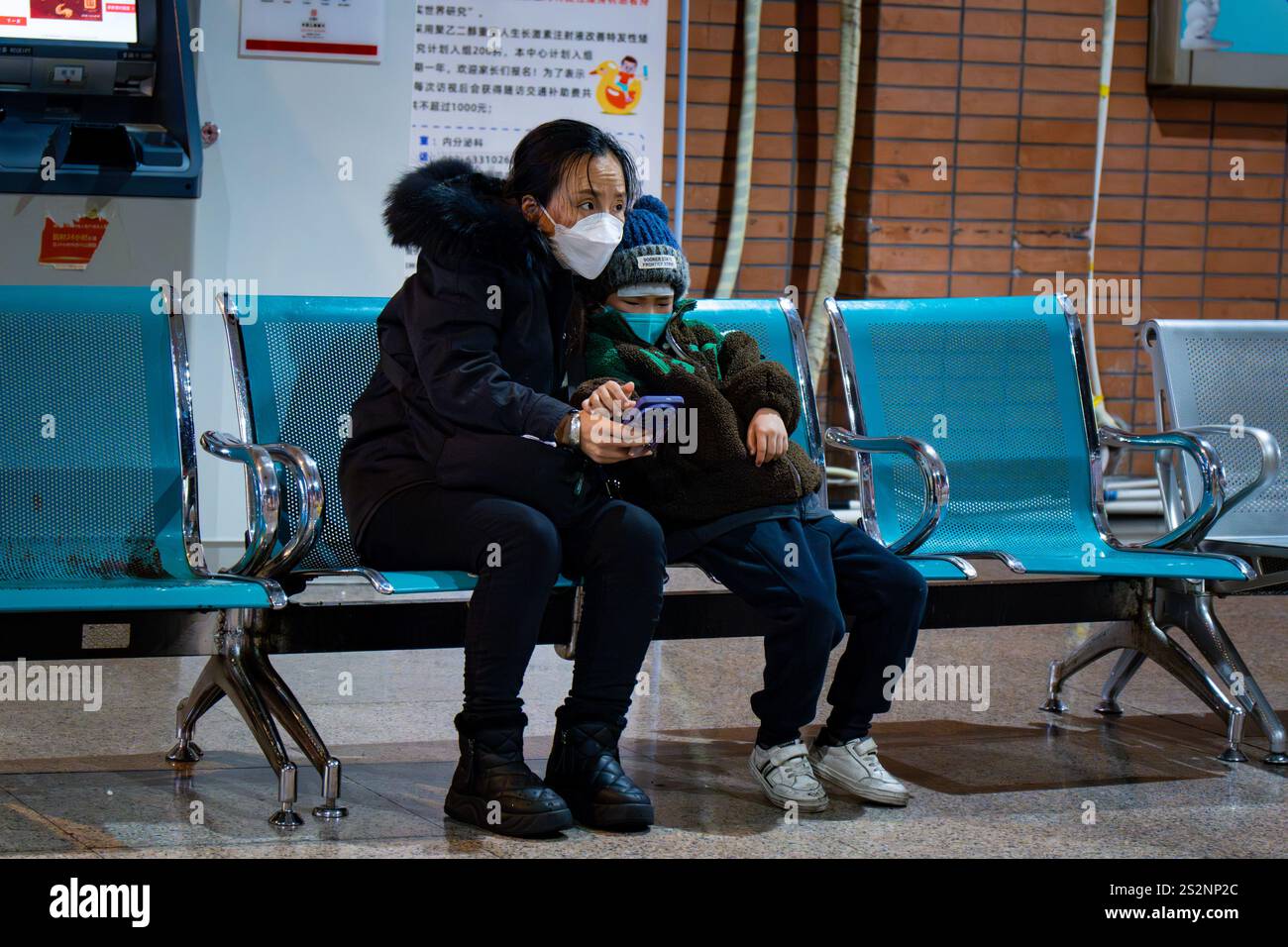 CHONGQING, CHINA - JANUARY 7, 2025 - Parents with their children ...