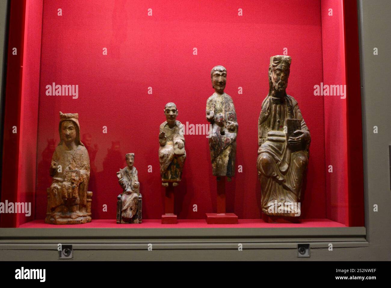 Five wooden Romanesque statues of Jesus Stock Photo - Alamy