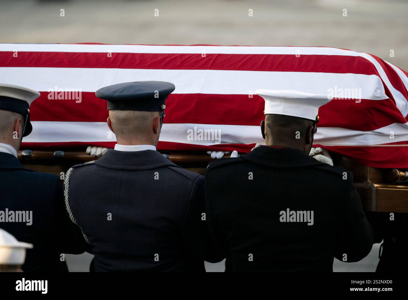Members of United States Navy transfer the casket of former United ...