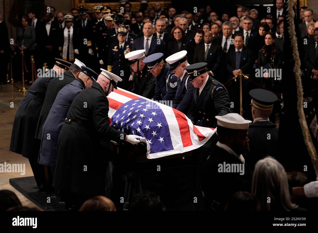 Washington, United States. 07th Jan, 2025. Military pallbearers carry ...