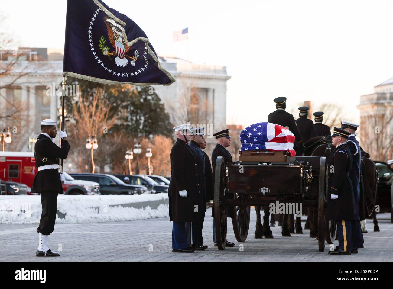 A horse-drawn caisson with the flag-draped casket of former President ...
