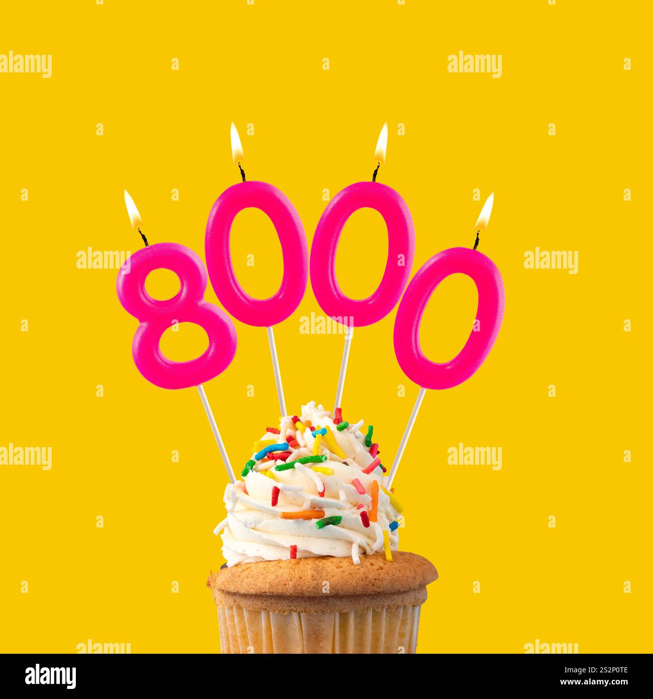 Candles forming the number 8000 - Yellow background Stock Photo - Alamy